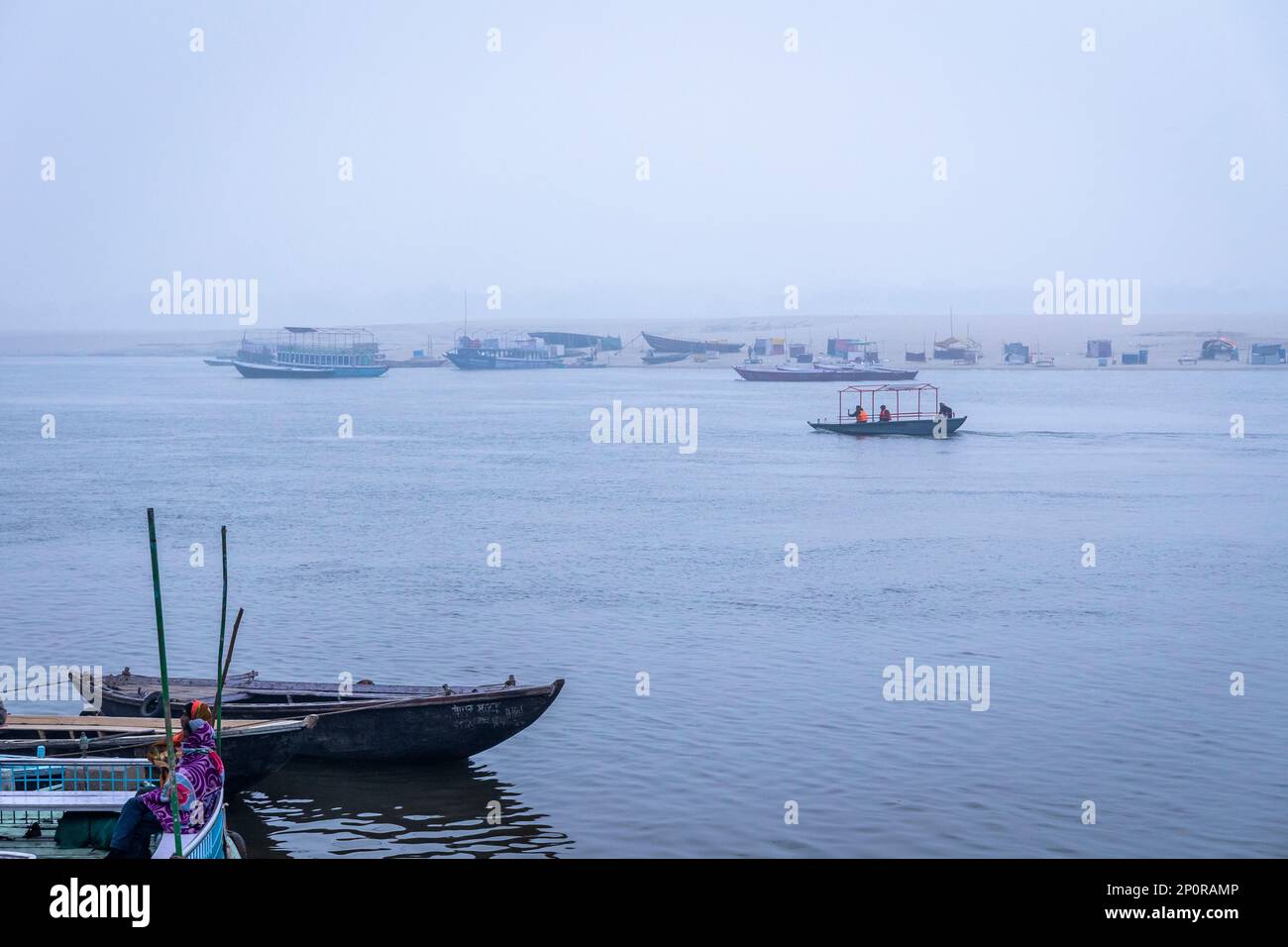 Tourists enjoying boat river to see the Varanasi Ghats from Ganga river ...