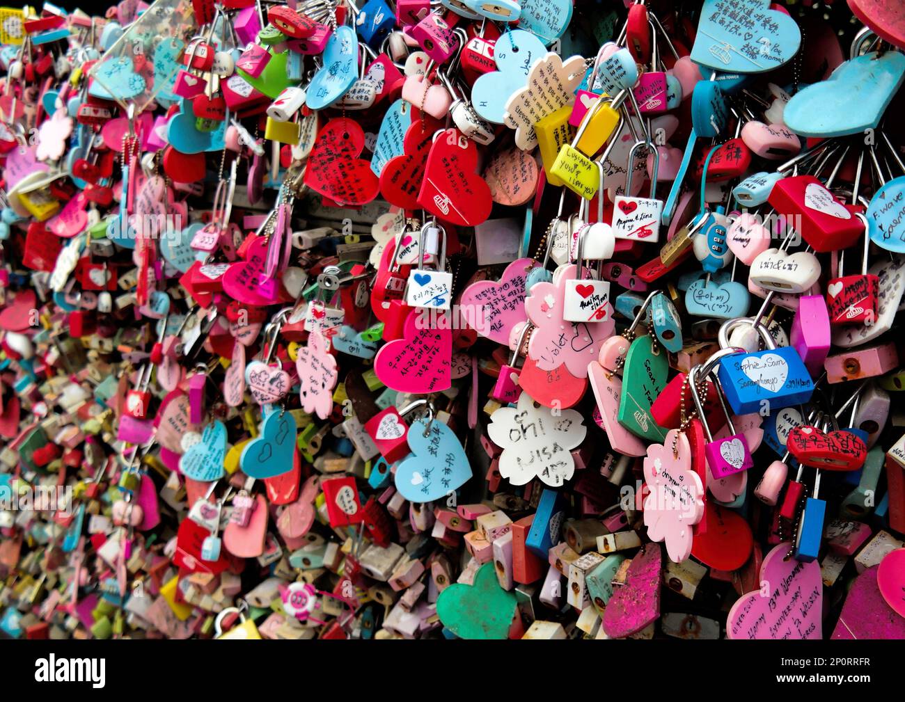 Seoul, South Korea - May 2019: Colorful love locks with couples' names ...