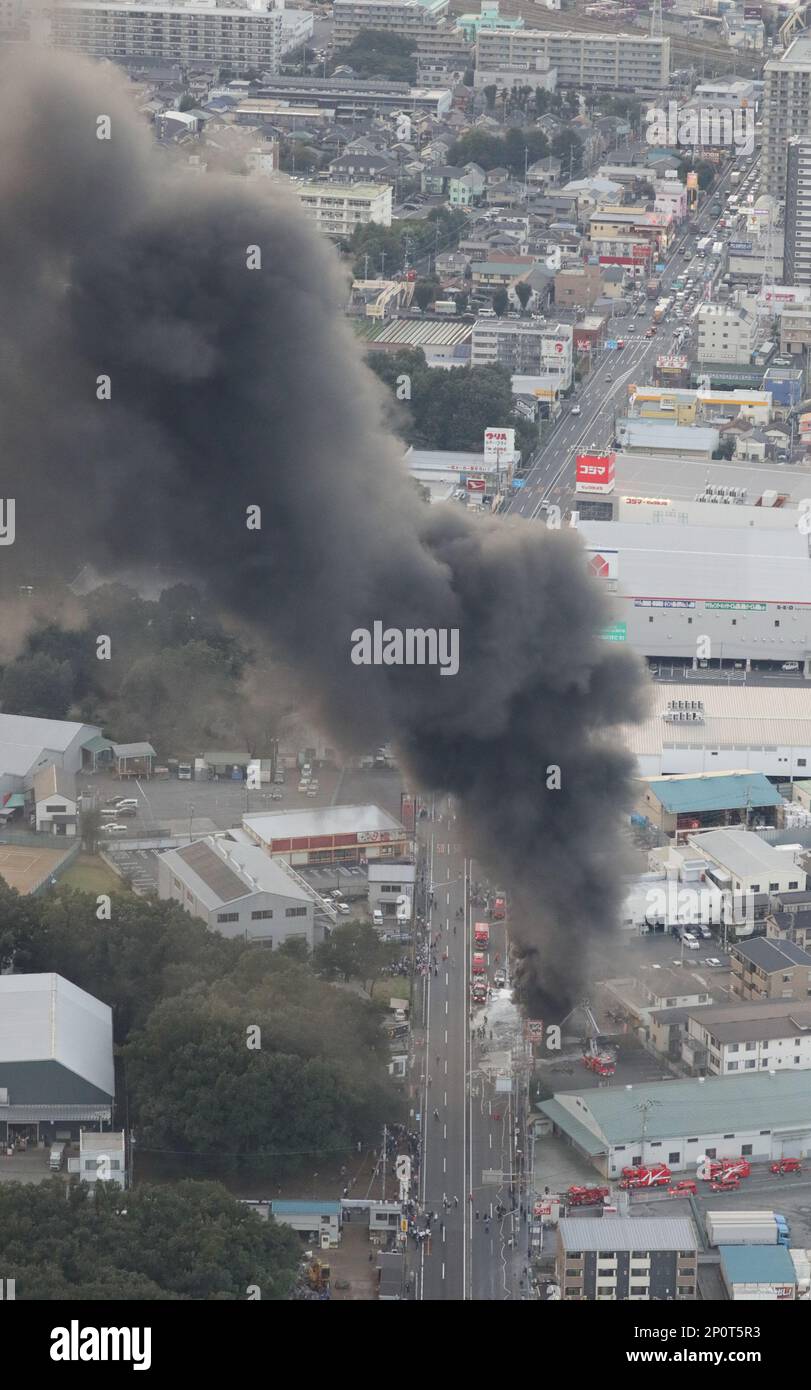 An aerial photo taken from Yomiuri's helicopter shows a column of black ...