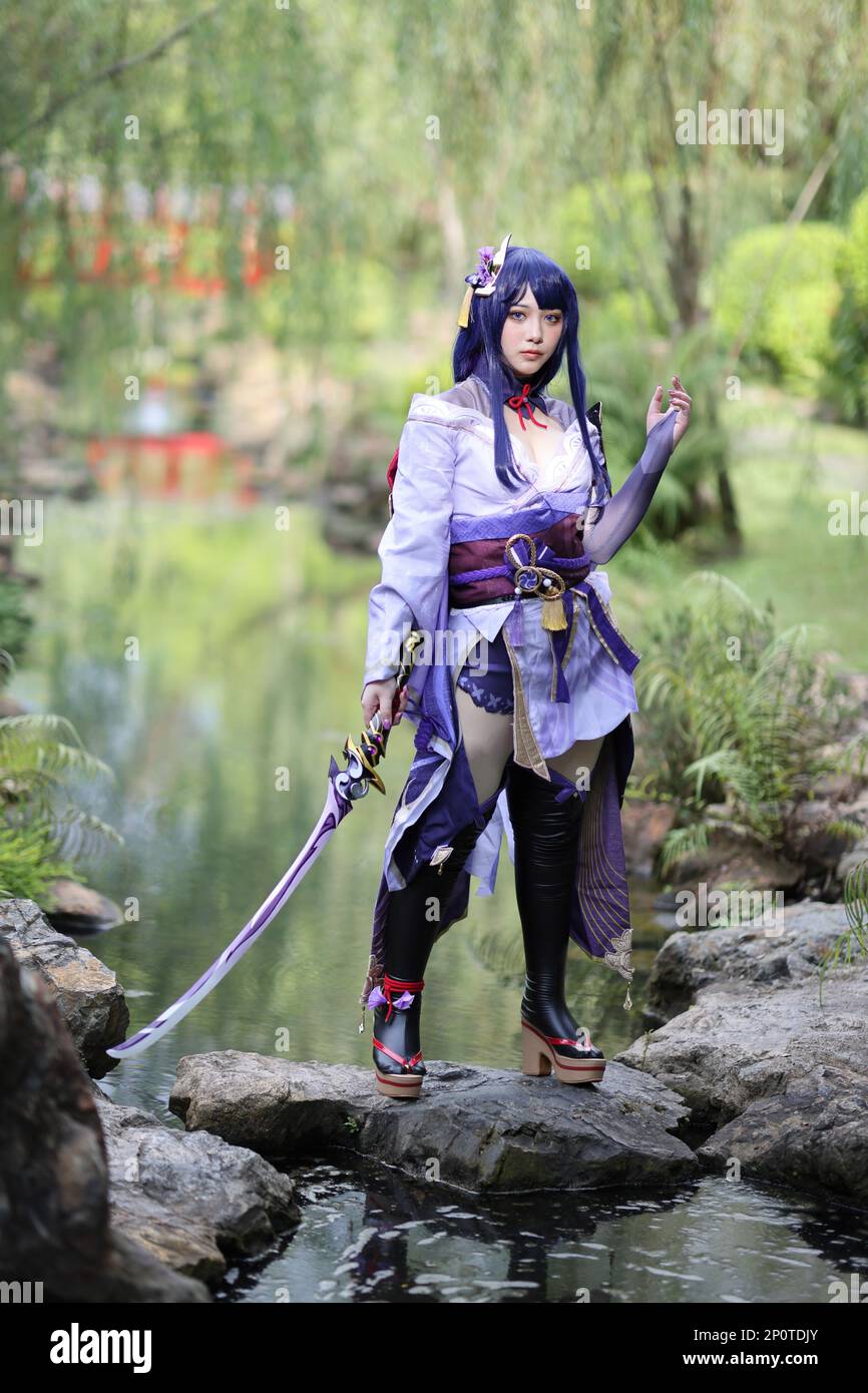 Portrait of a beautiful young woman game cosplay with samurai dress ...