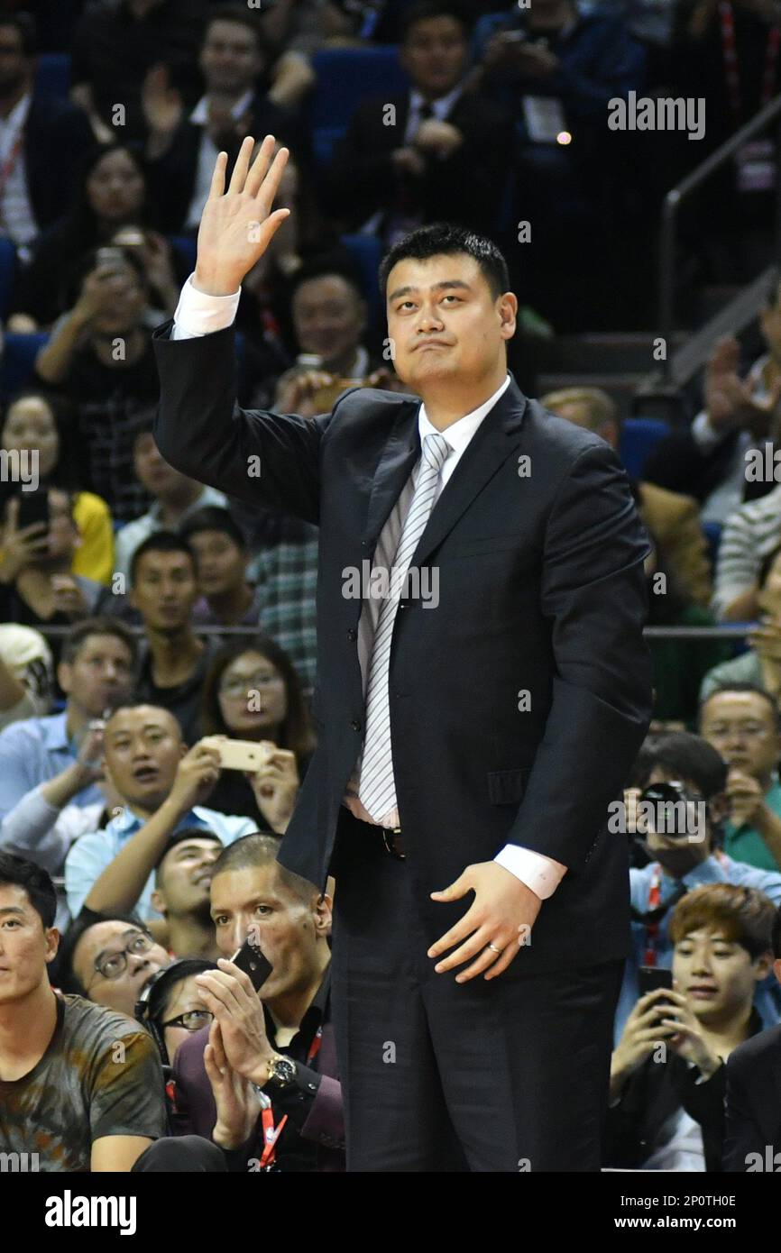 Retired Chinese basketball superstar Yao Ming waves to spectators ...