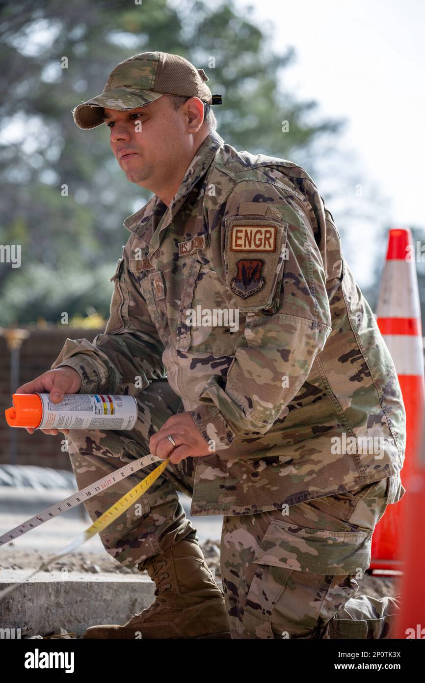Master Sgt. Jason Lathrop, 4th Civil Engineer Squadron engineer, uses a ...