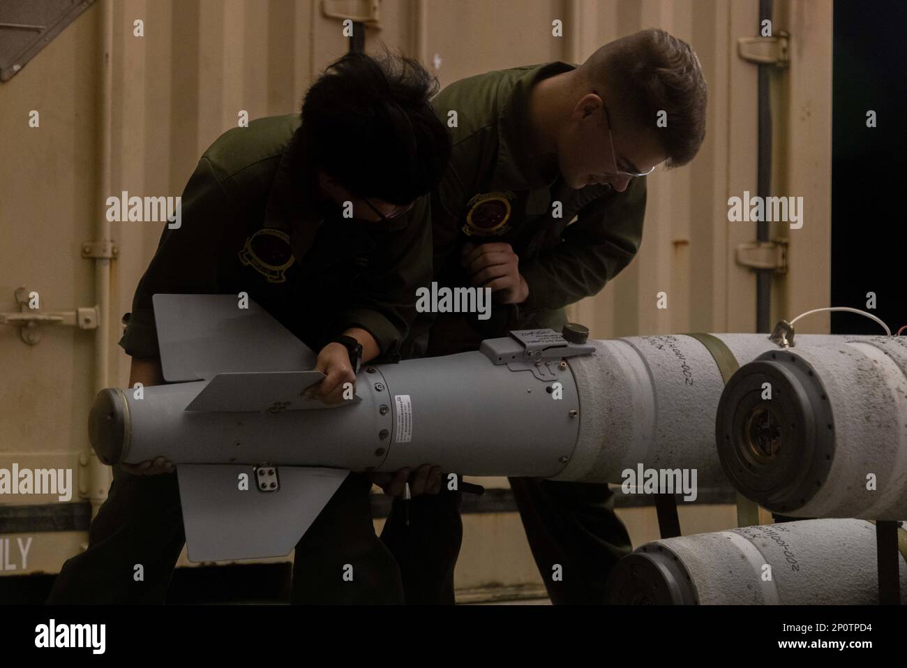 U.S. Marine Corps Cpl. Rita Chen, left, and Cpl. Braydon Foster, both ...