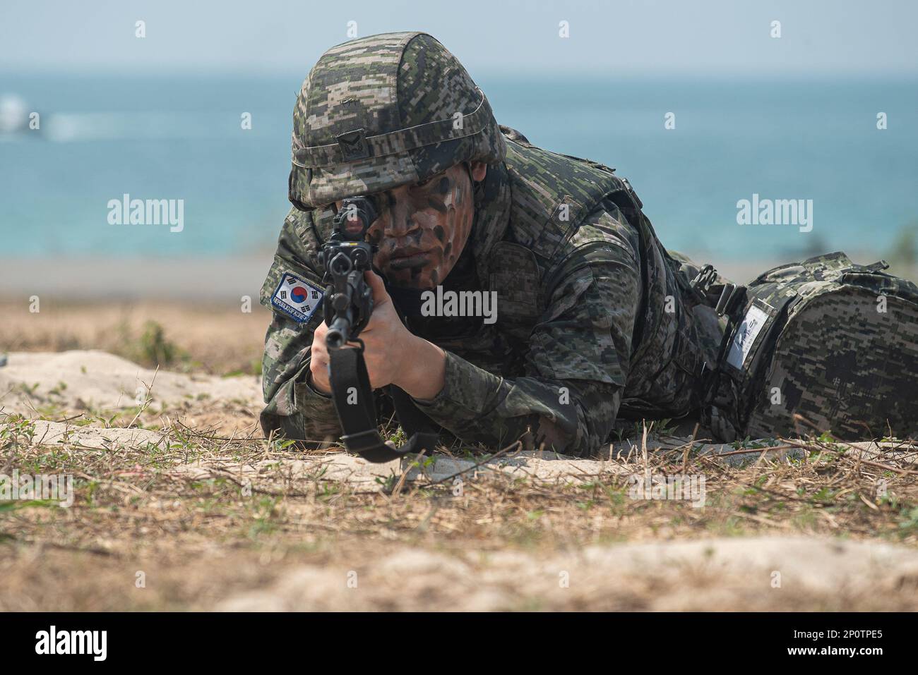 A South Korean marine participates in an amphibious assault exercise as ...
