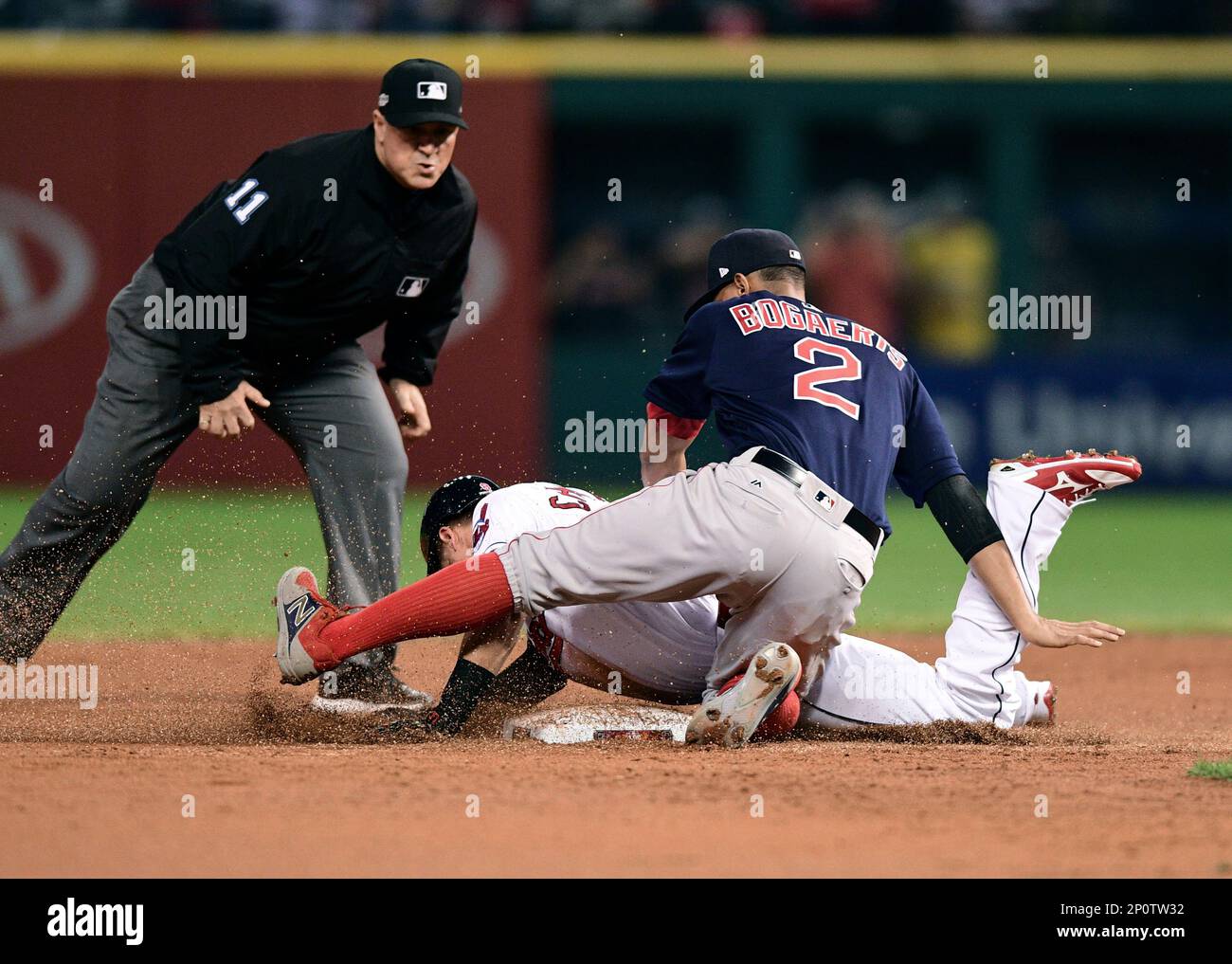 Boston Red Sox shortstop Xander Bogaerts (2) tags out Cleveland Indians ...