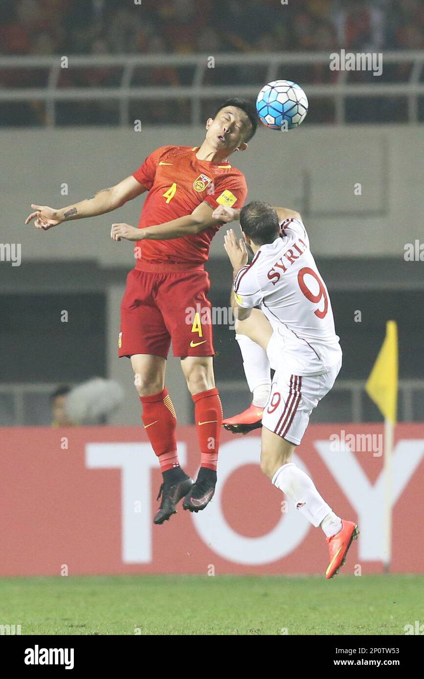 Jiang Zhipeng of China, left, challenges Mahmoud Al Mawas of Syria in ...