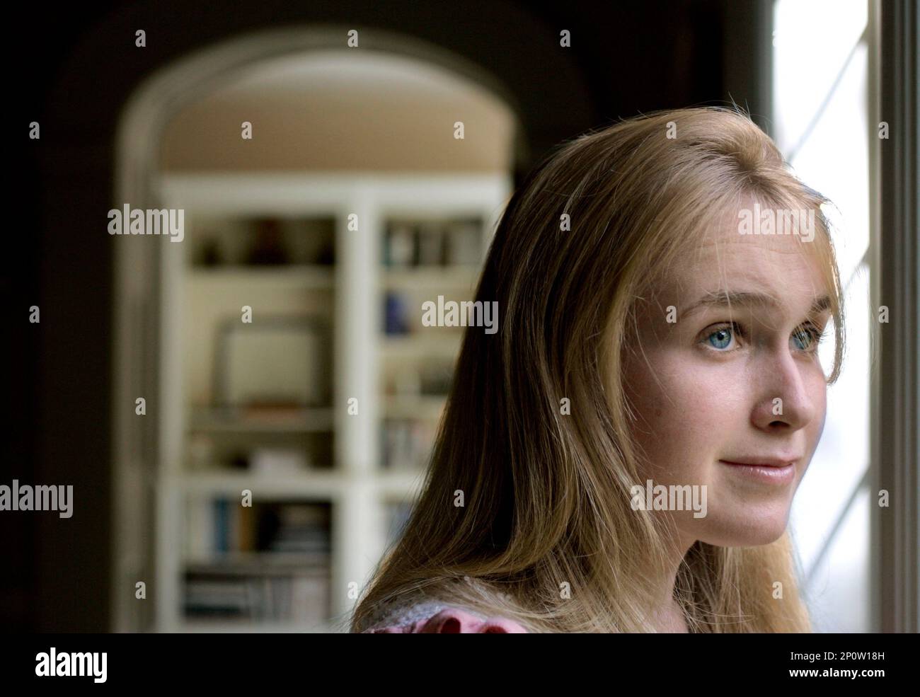 In this photo taken in 2005, Amy Winn poses in her home in Eugene, Ore ...