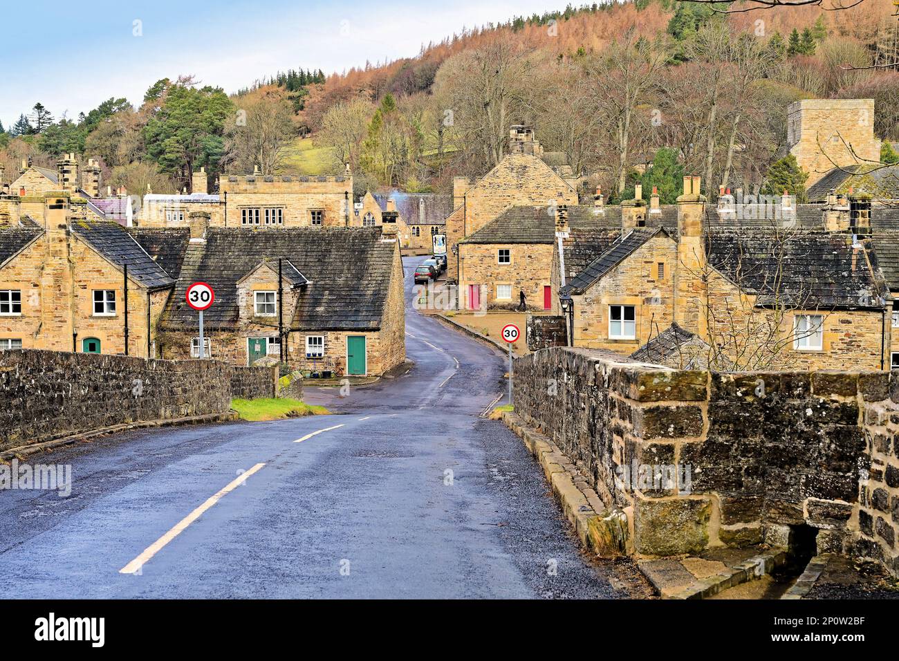 Road into Blanchland village over the bridge from Stanhope showing the ...