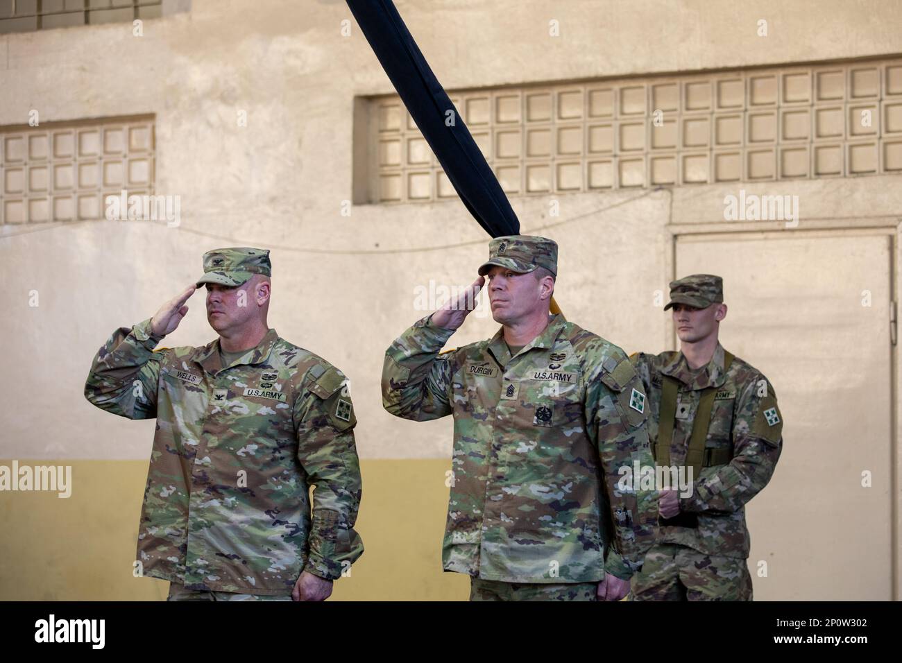 U.S. Army Col. Damon Wells, left, commander of the 4th Infantry Division Artillery (4 ID) and ...