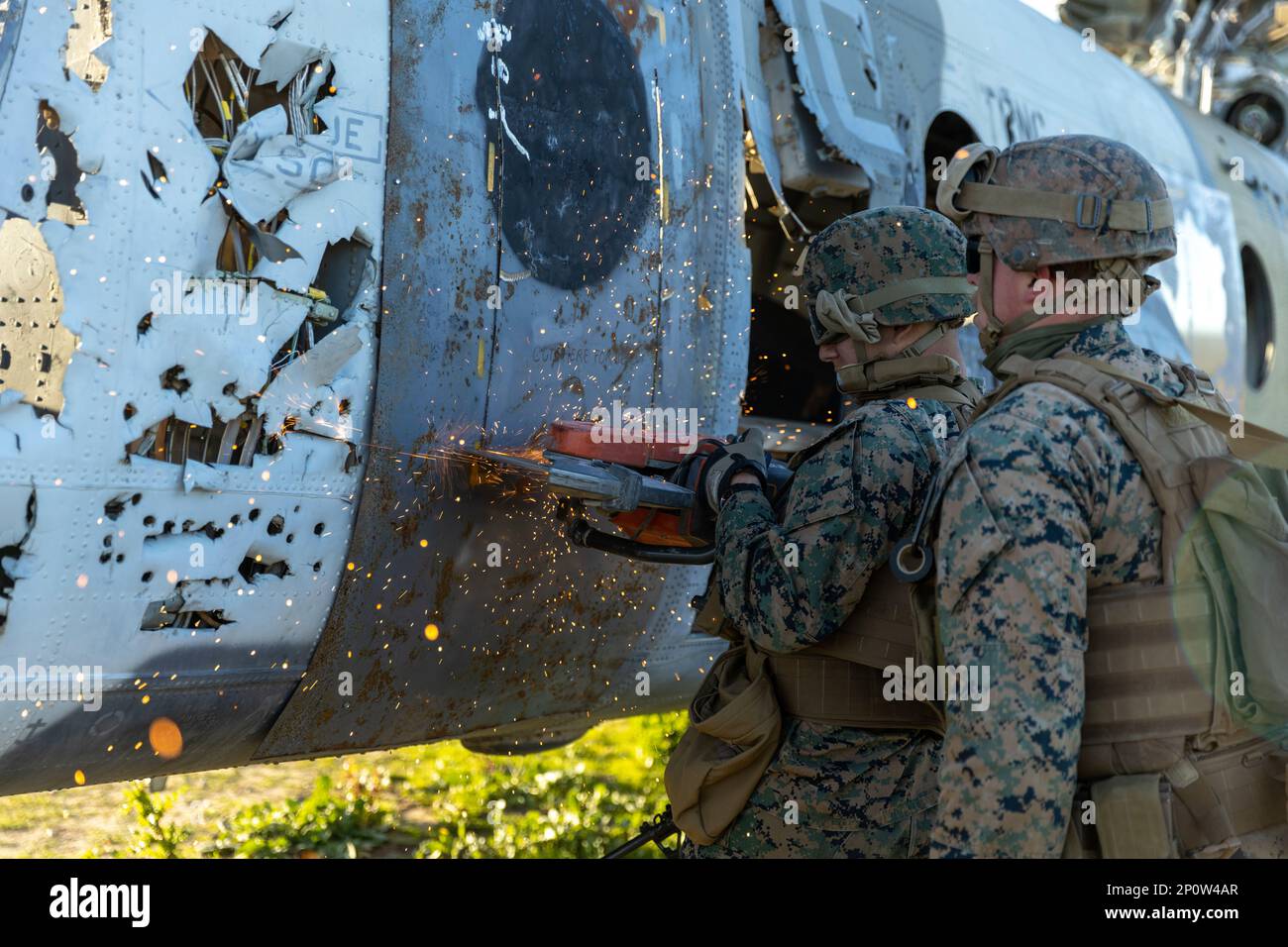 U.S. Marine Corps Lance Cpl. Steven Rivas, left, a rescue-man, with ...