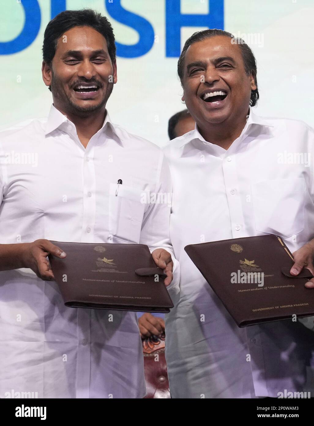 Chief Minister of Andhra Pradesh state Y S Jagan Mohan Reddy, left, and Chairman of Reliance ...