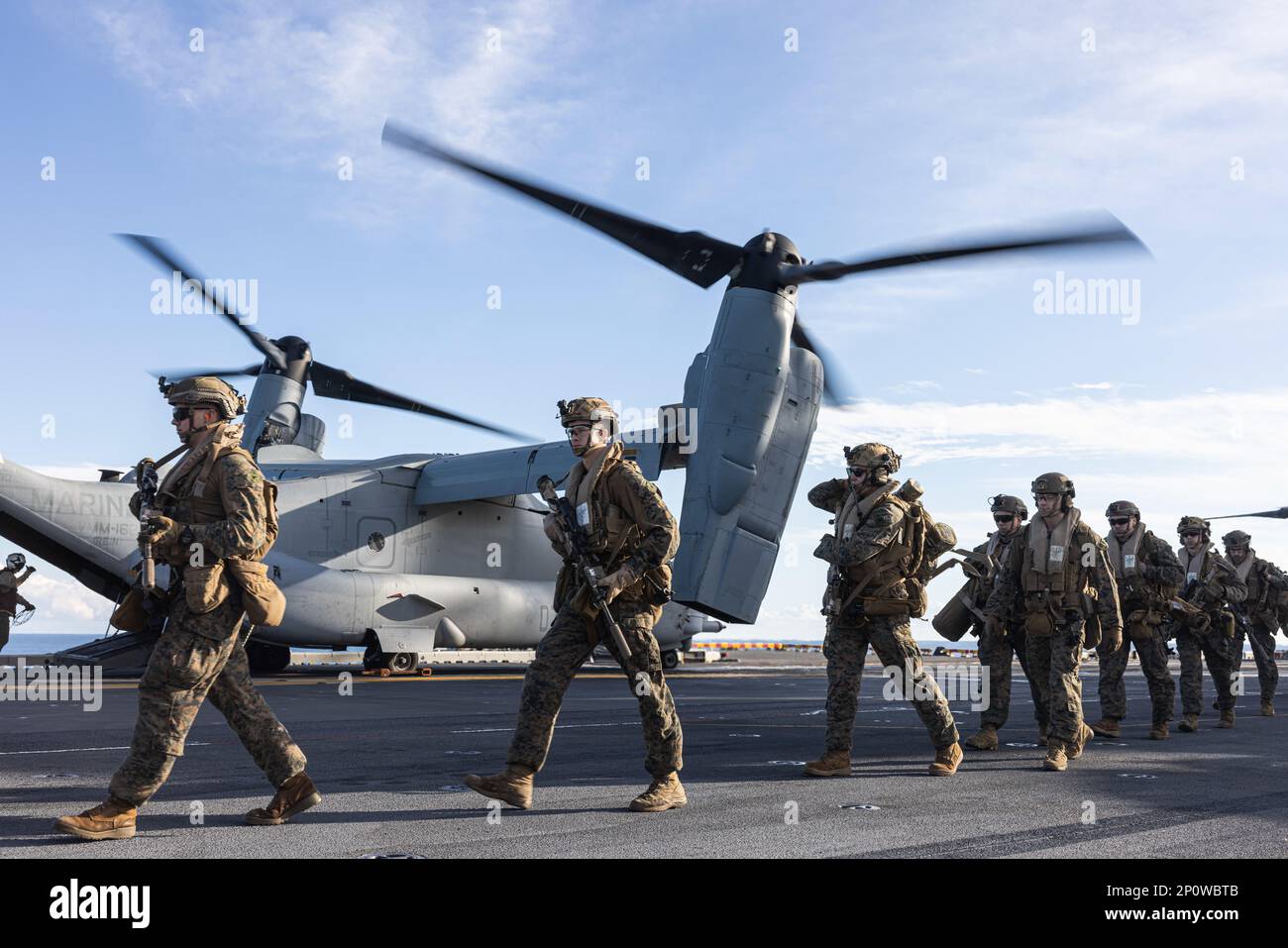 U.S. Marines assigned to Battalion Landing Team 1/6 prepare to board a ...