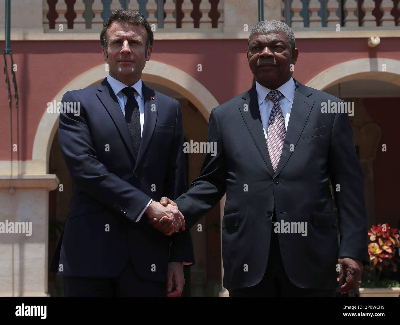 French President Emmanuel Macron, left, and his Angolan counterpart ...