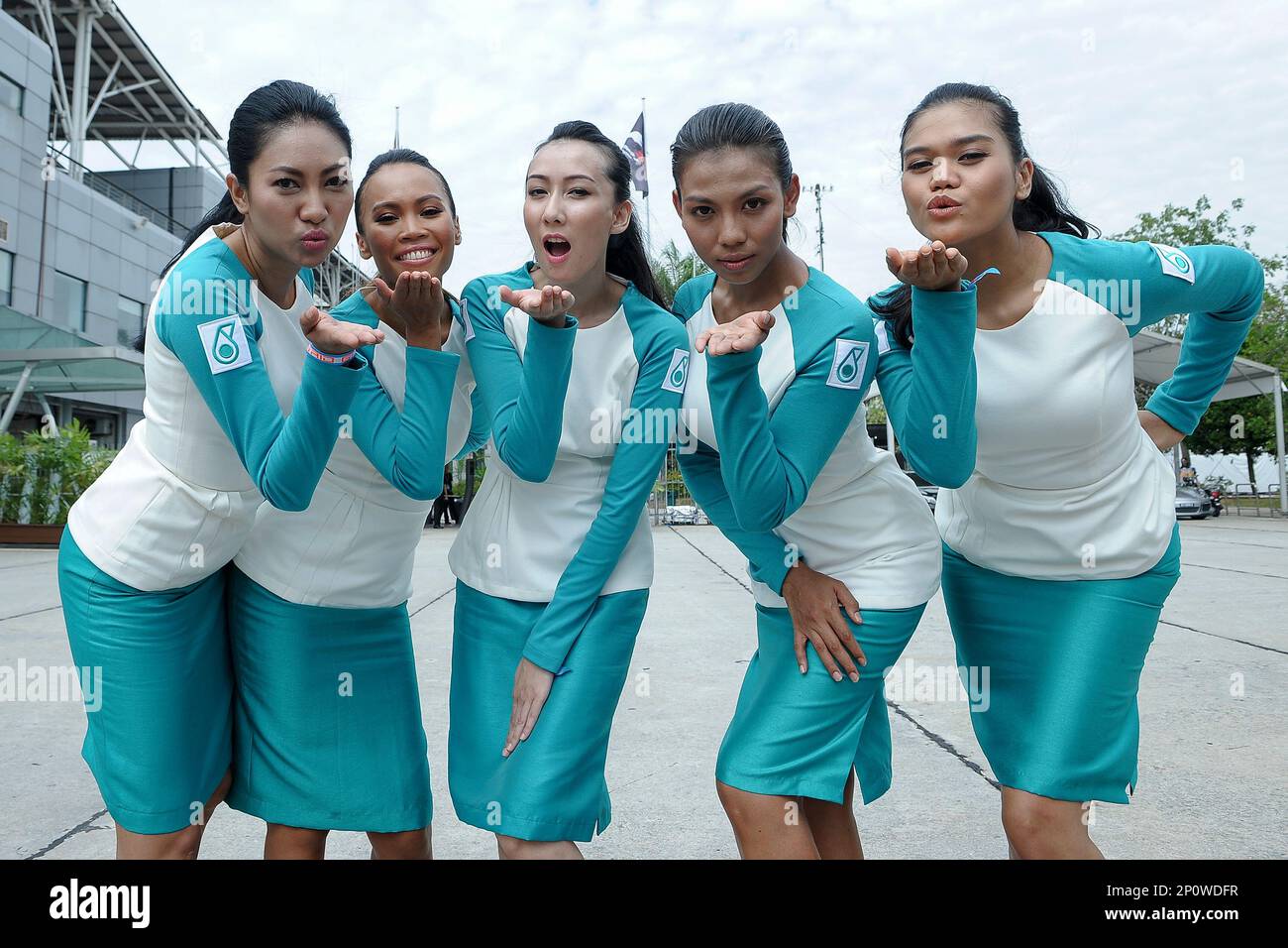 01 October 2016: Grid girls pose for photograph at the paddock of the ...