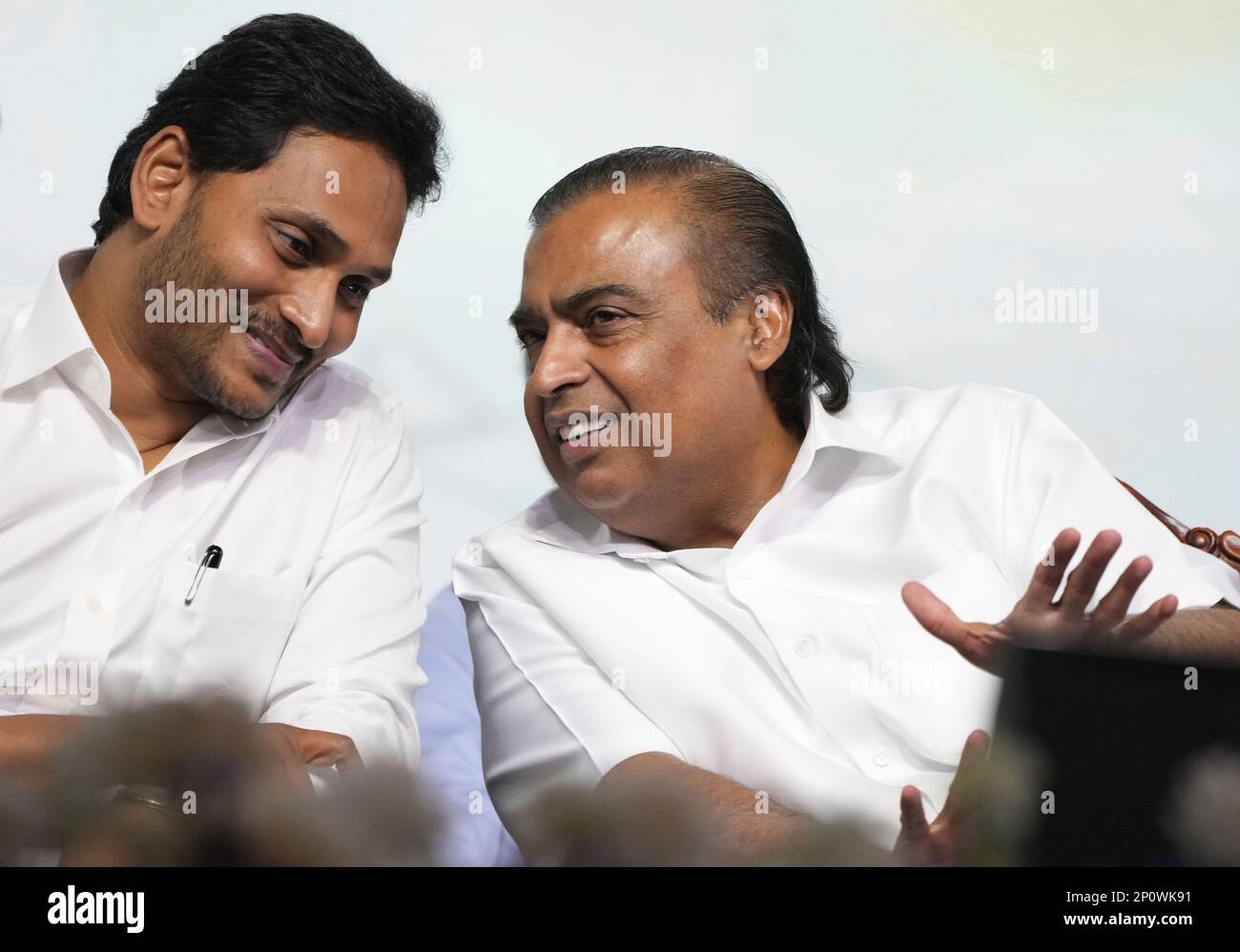 Chief Minister of Andhra Pradesh state Y S Jagan Mohan Reddy, left, listens to Chairman of ...