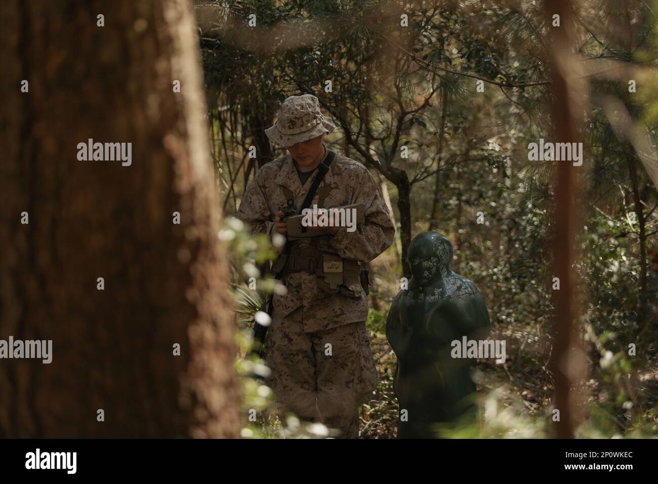 Recruits with Charlie Company, 1st Recruit Training Battalion, complete the Land Navigation ...
