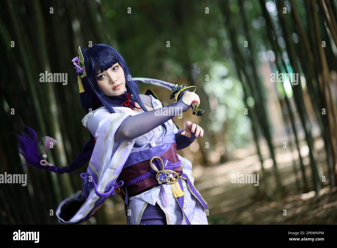 Portrait of a beautiful young woman game cosplay with samurai dress ...