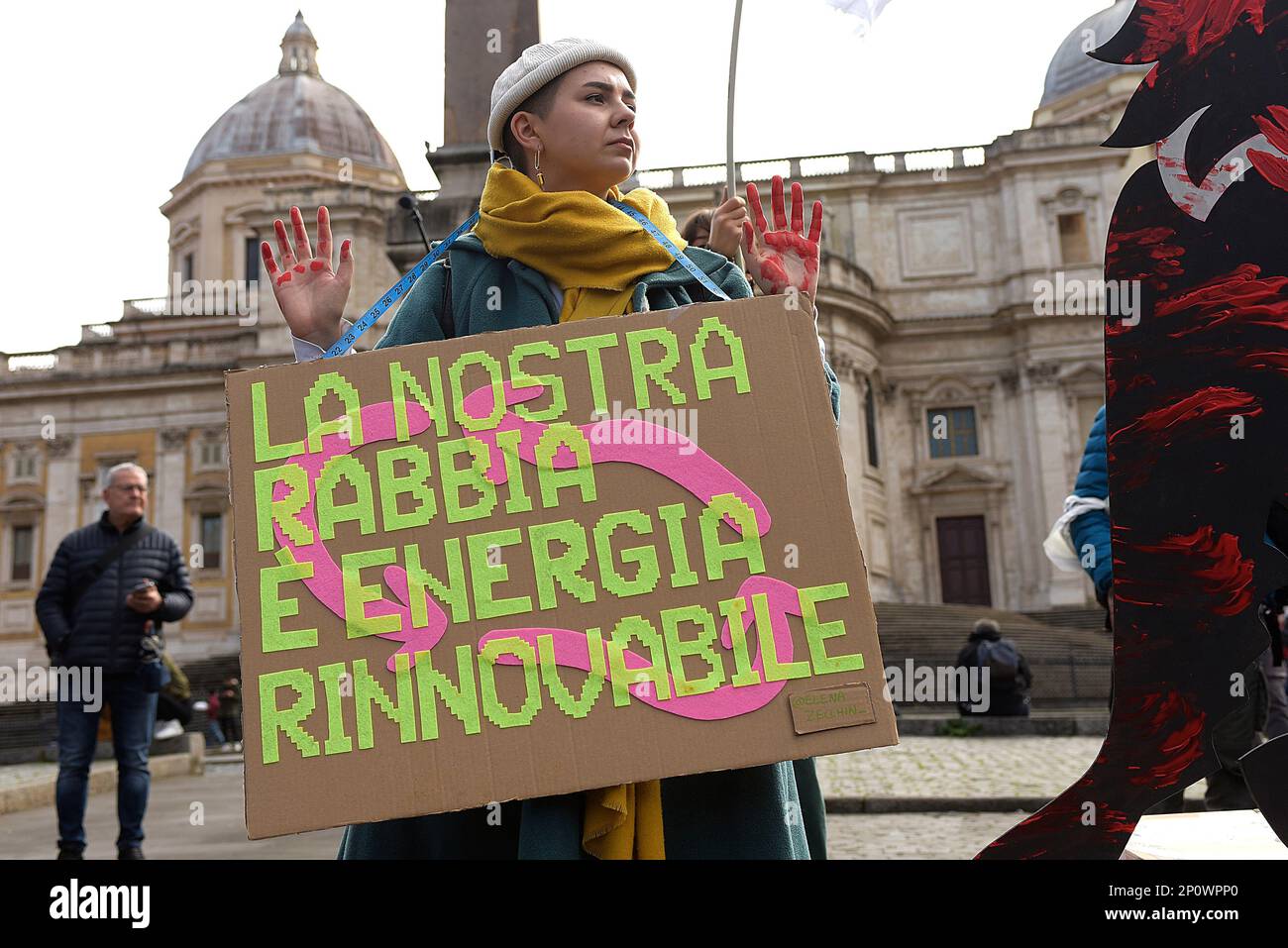 Rome, Italy. 03 march 2023. A protester shows his hands painted red and ...
