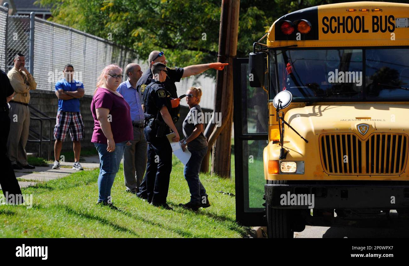 Police and rescue personnel work at the scene of a shooting on a school ...