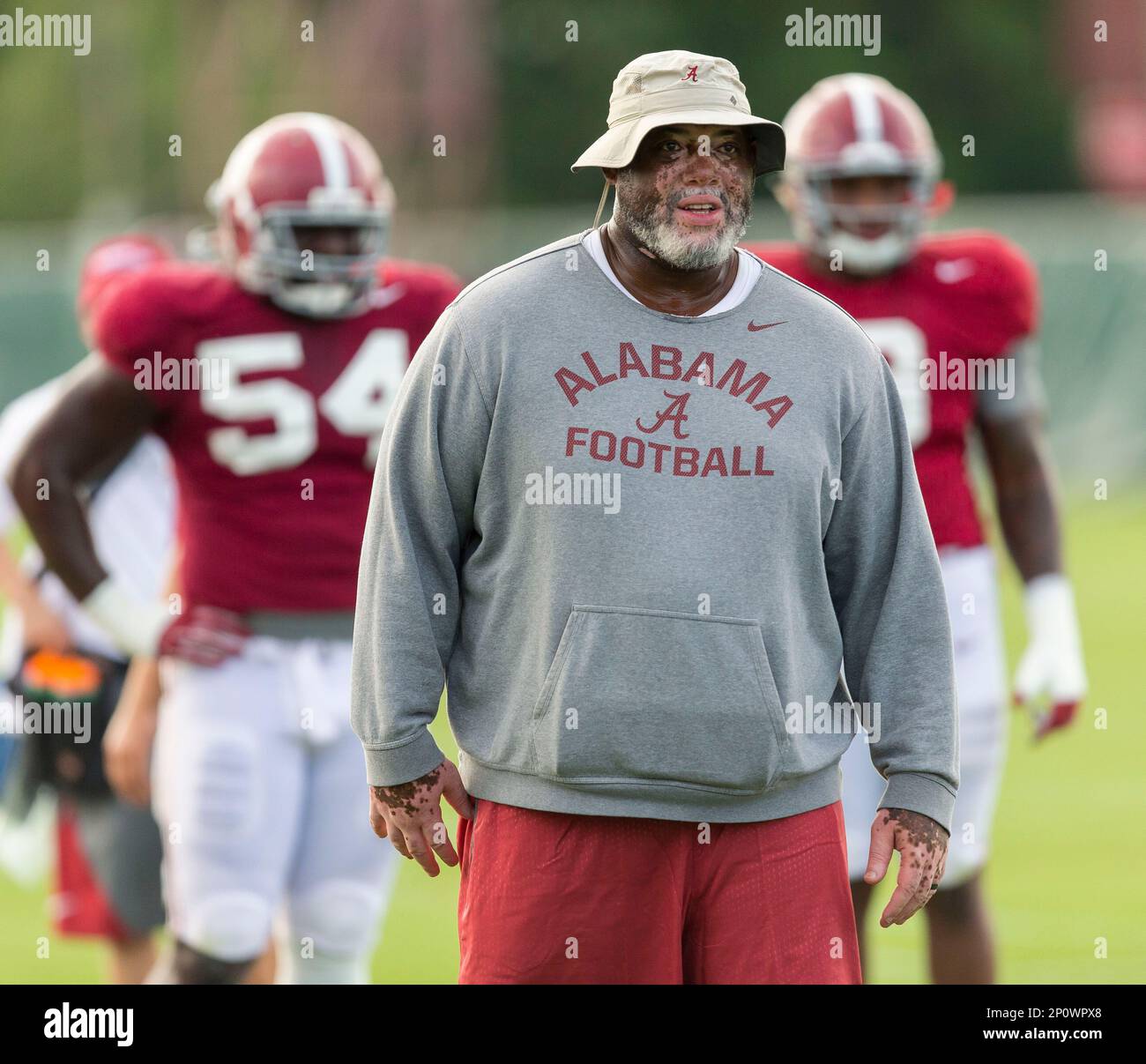 Alabama defensive line coach Karl Dunbar works with his defensive ...