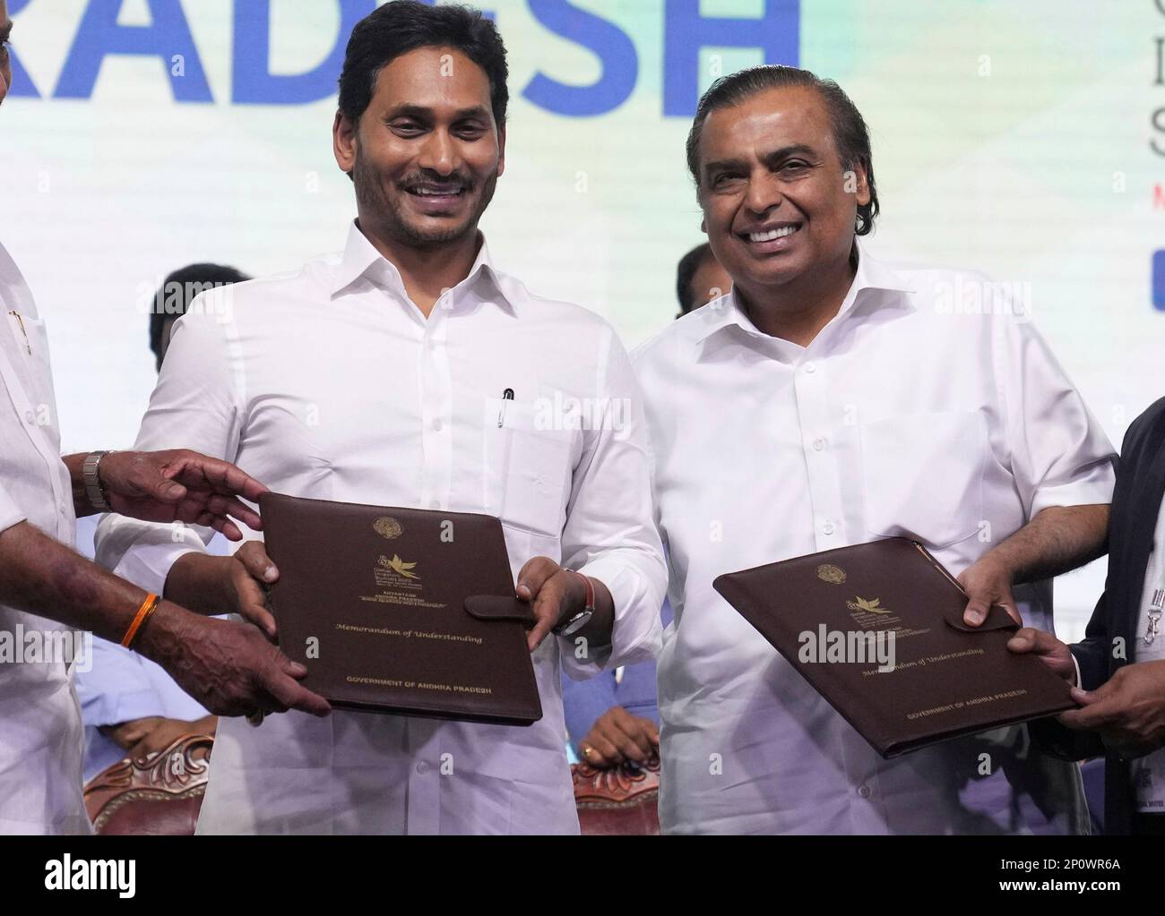 Chief Minister of Andhra Pradesh state Y S Jagan Mohan Reddy, left, and Chairman of Reliance ...
