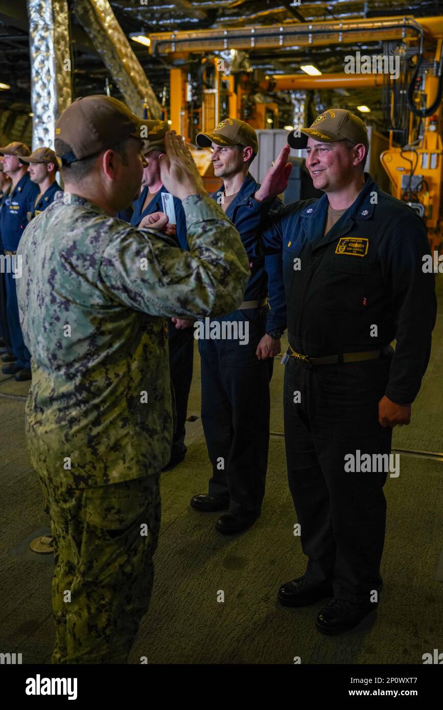 SINGAPORE (Feb. 3, 2023) Cmdr. Andrew Laidler, left, the former ...