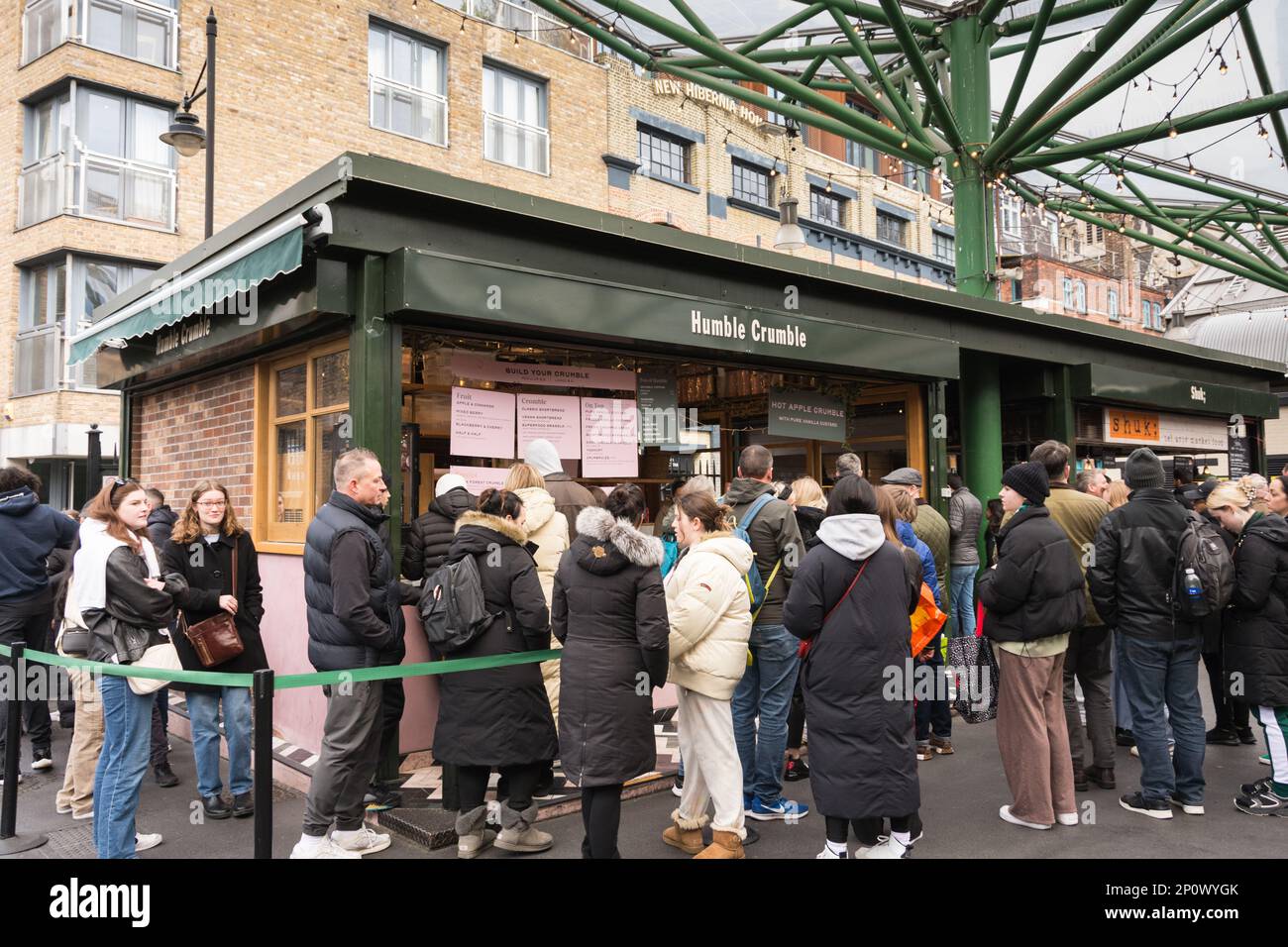 Long queues of people outside Humble Crumble market stall and kiosk ...