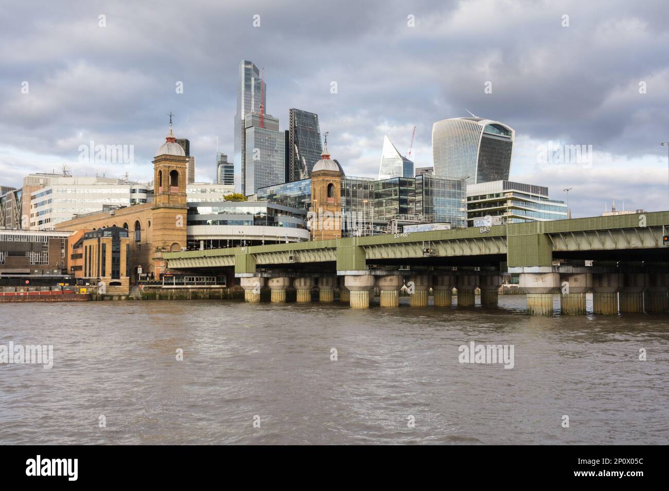 Cannon Street station and railway bridge and City of London skyscrapers ...