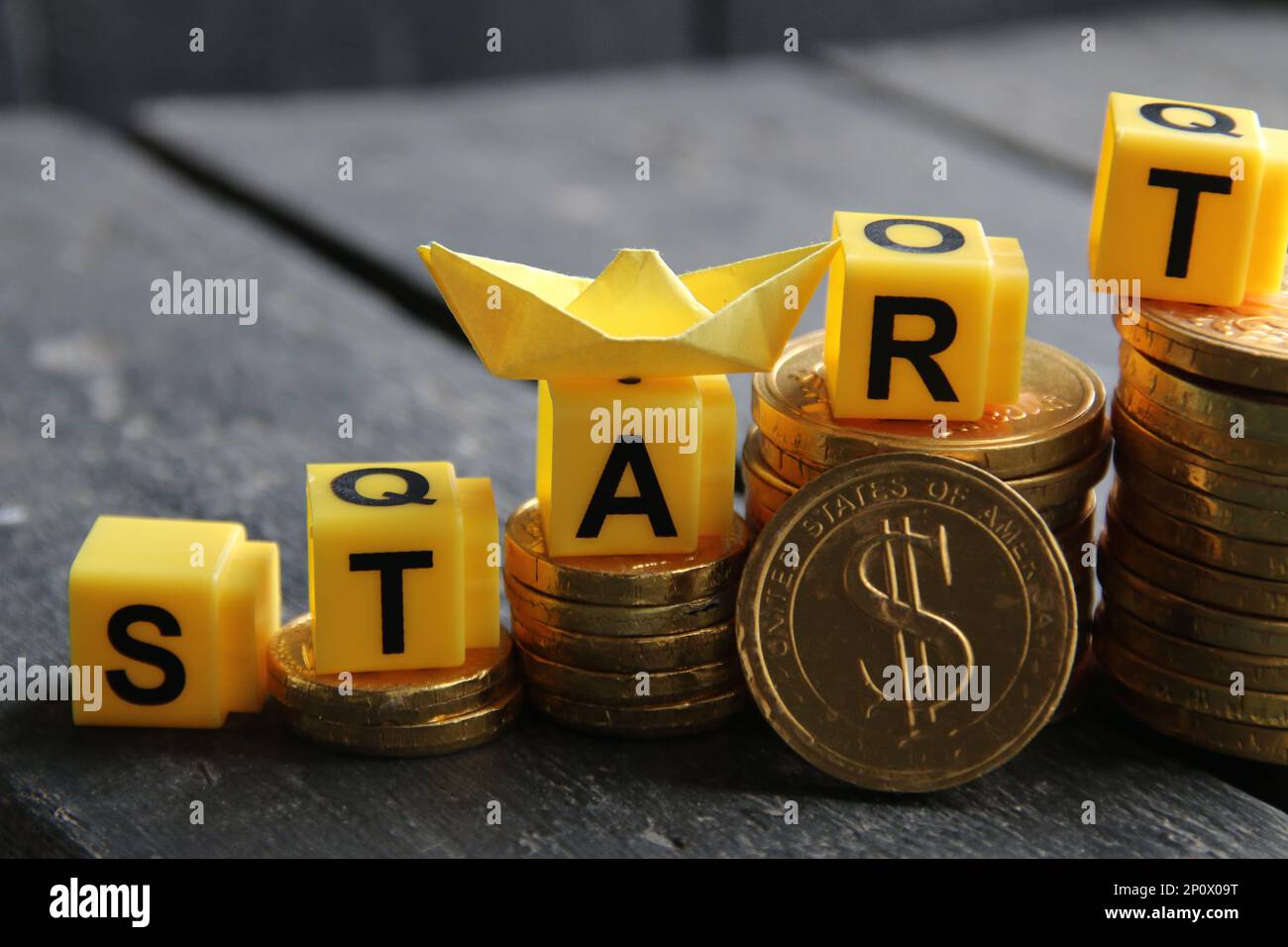 Sturt up. Golden coins on vintage background. Money growing concept ...