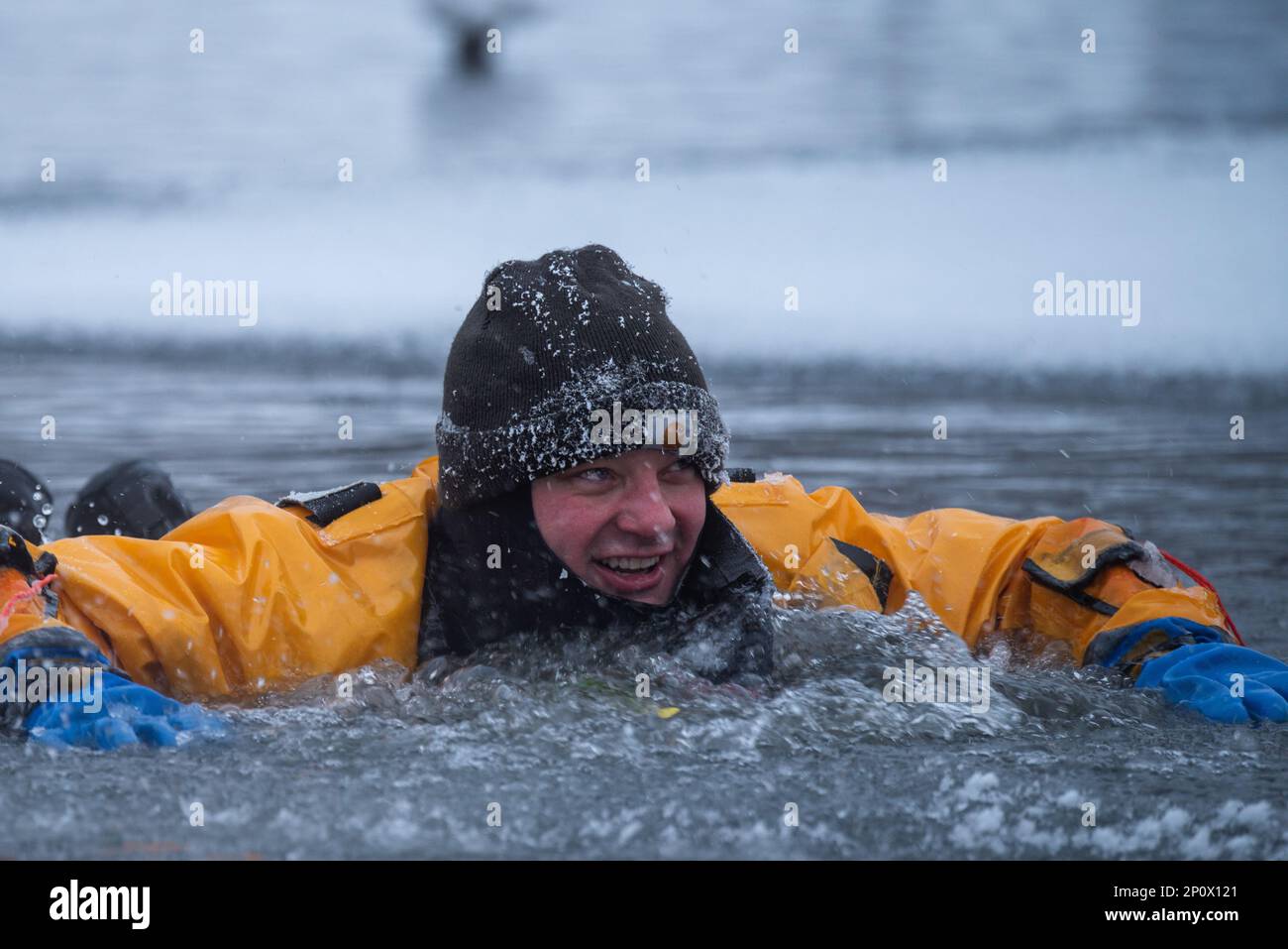 Karl Schultz, a firefighter for the 673d Civil Engineer Squadron, swims ...