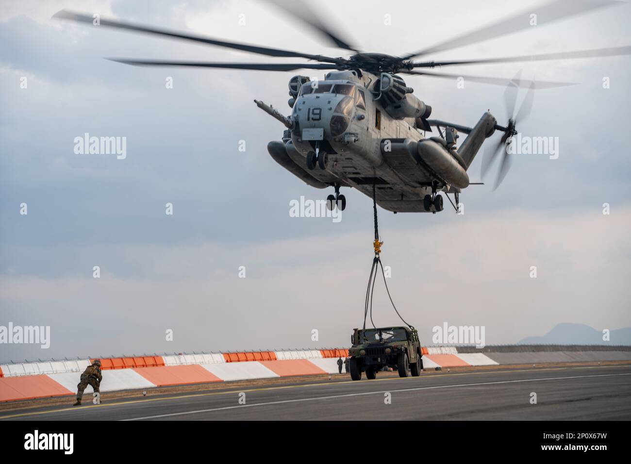 A U.S. Marine Corps CH-53E Super Stallion helicopter with Marine Medium ...
