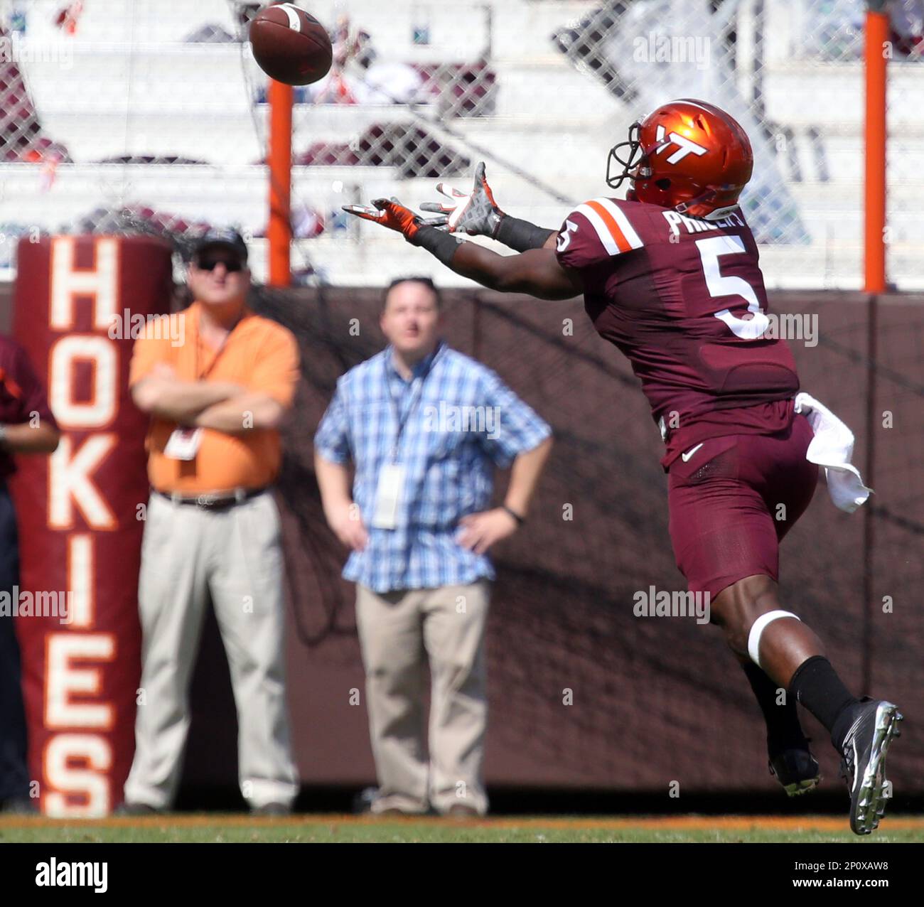 Virginia Tech wide receiver Cam Phillips (5) catches a touchdown pass ...