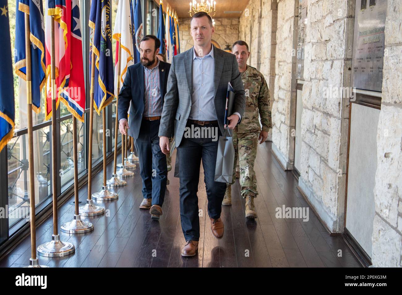 Tim Dill (center), military legislative assistant to U.S. Senator Ted ...