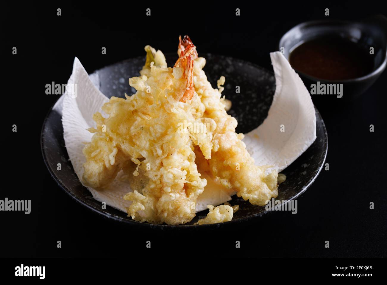 Shrimp tempura Japanese food isolated on a black background Stock Photo ...