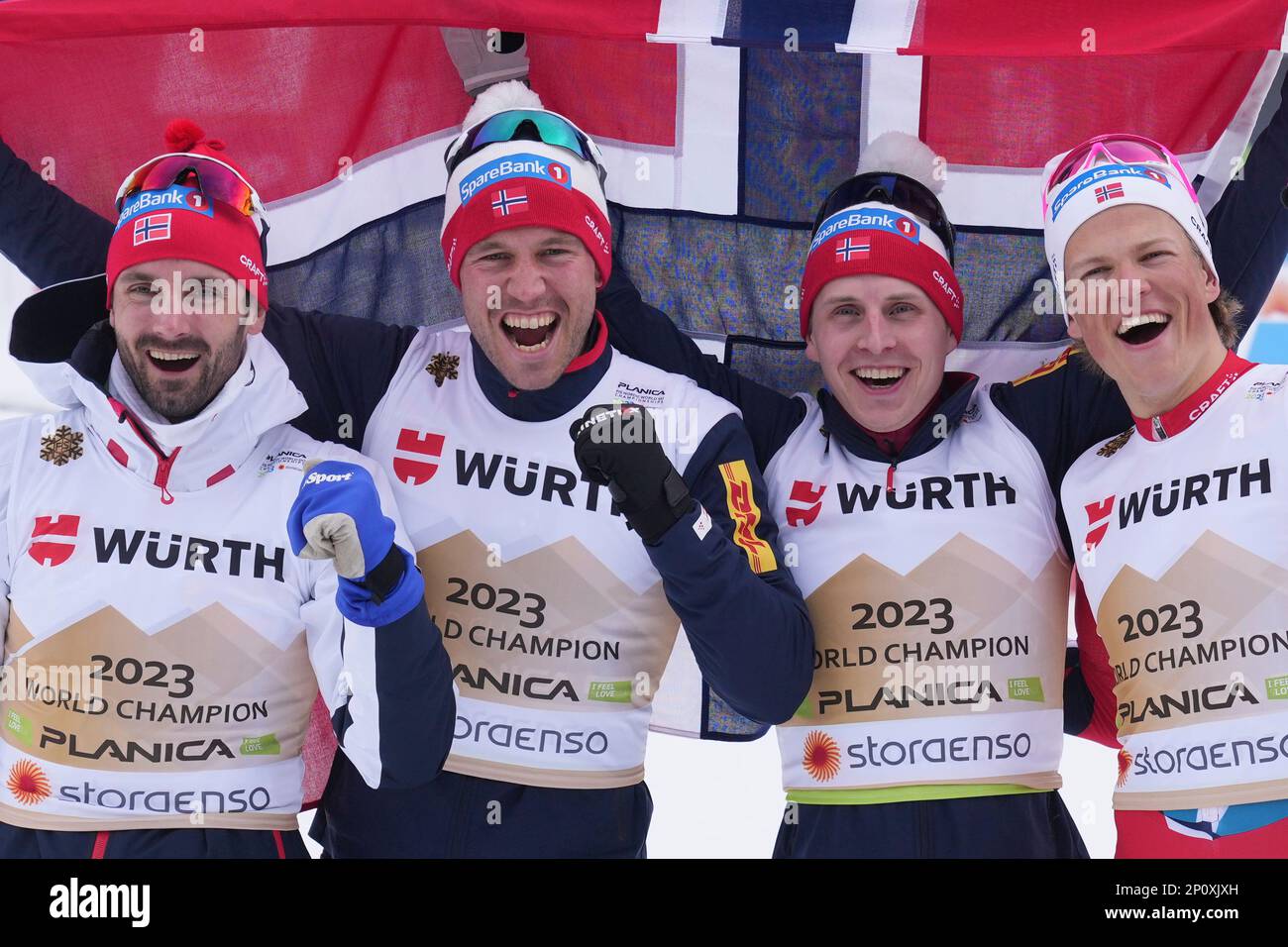 Members of team Norway celebrate their victory in the Cross Country Men ...