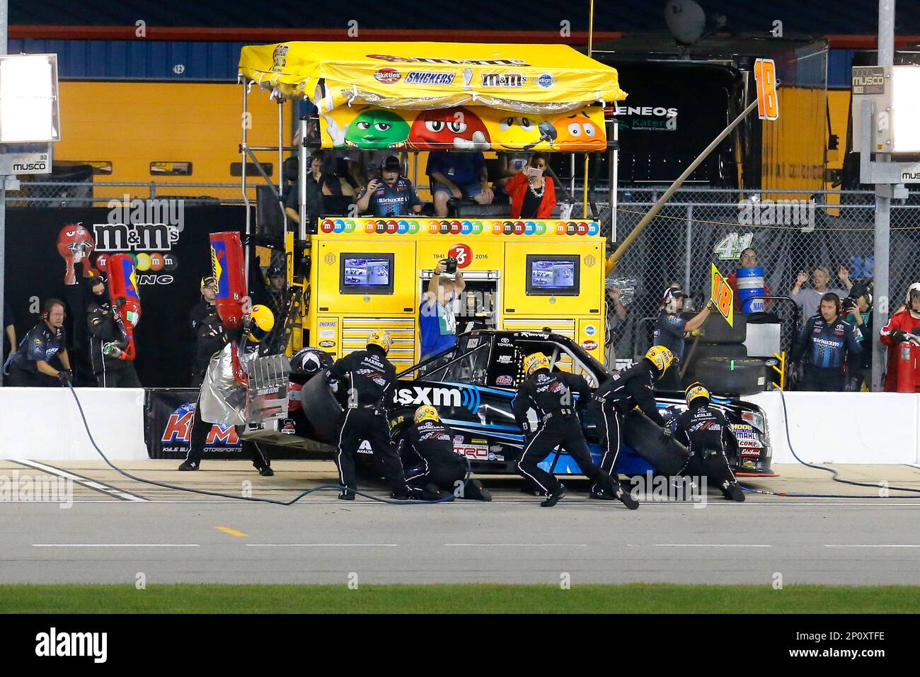 Kyle Busch makes a pit stop during the NASCAR Truck Series American ...