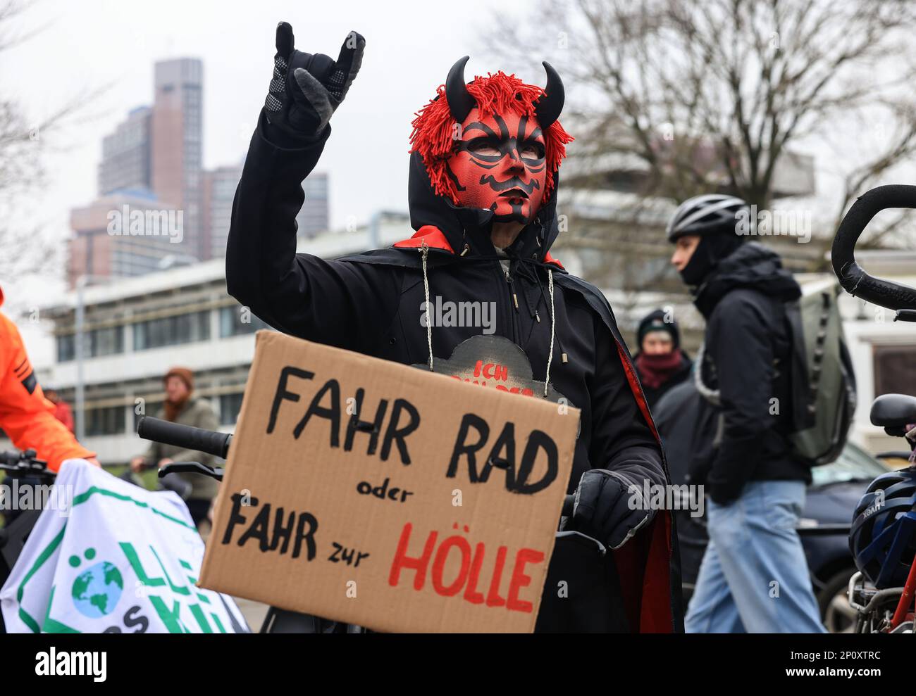 Cologne, Germany. 03rd Mar, 2023. A demonstrator dressed as a devil ...