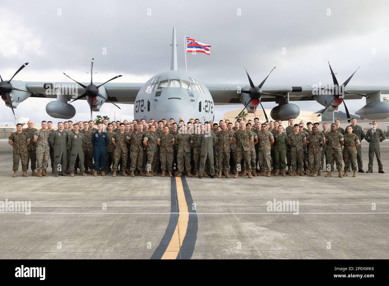 U.S. Marines with Marine Aerial Refueler Transport Squadron 153 pose ...
