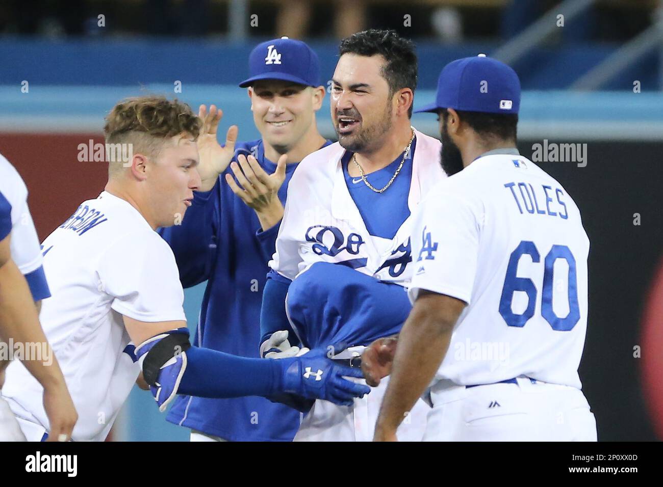 September 19, 2016: Dodger players celebrate their walk off win at second base with hero Los ...