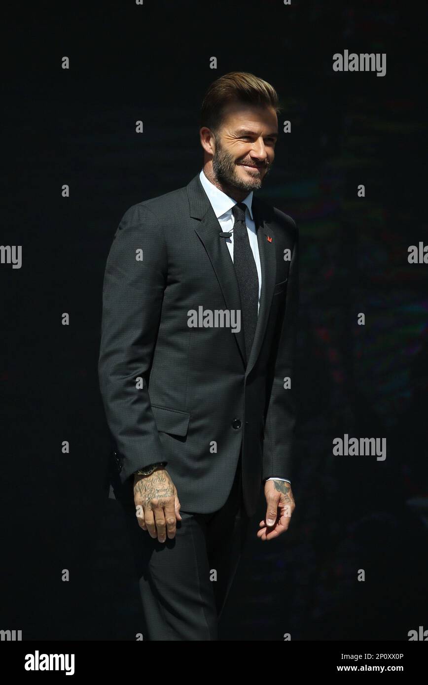English soccer star David Beckham attends a press conference for Luneng ...
