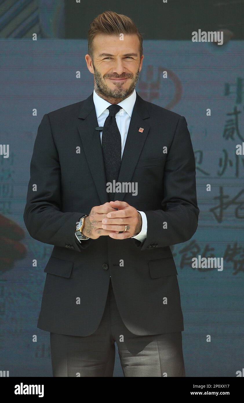 English soccer star David Beckham attends a press conference for Luneng ...