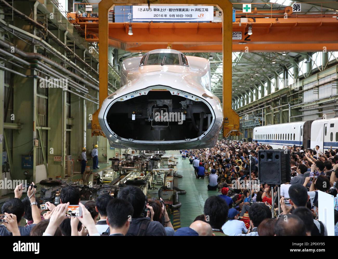 Railway buff take pictures of " the flying shinkansen,'' locomotive ...