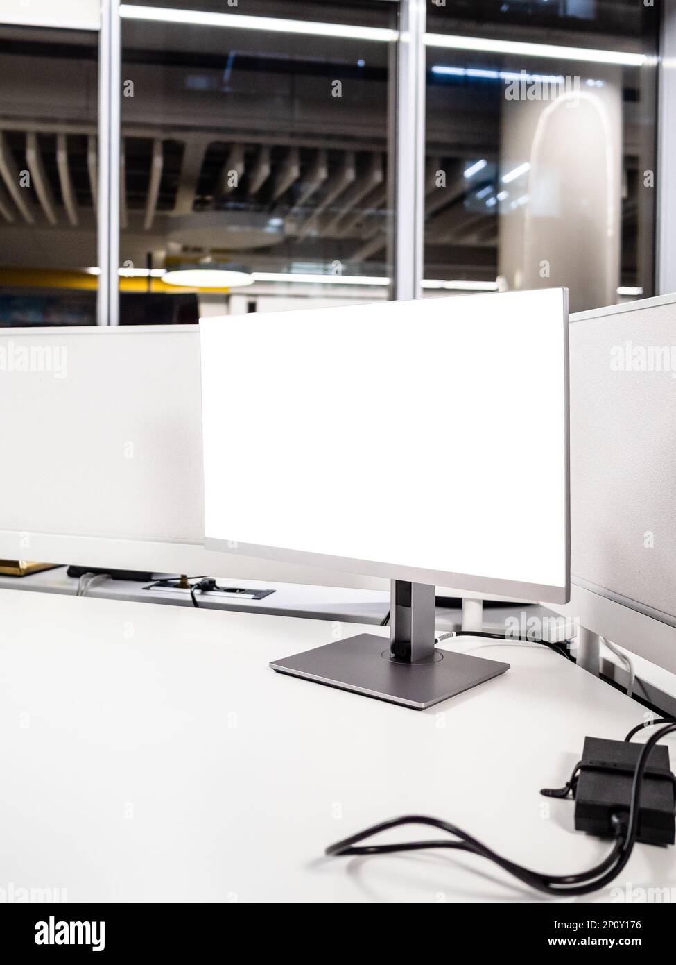 computer monitor with cutout screen on white desktop in office late at ...