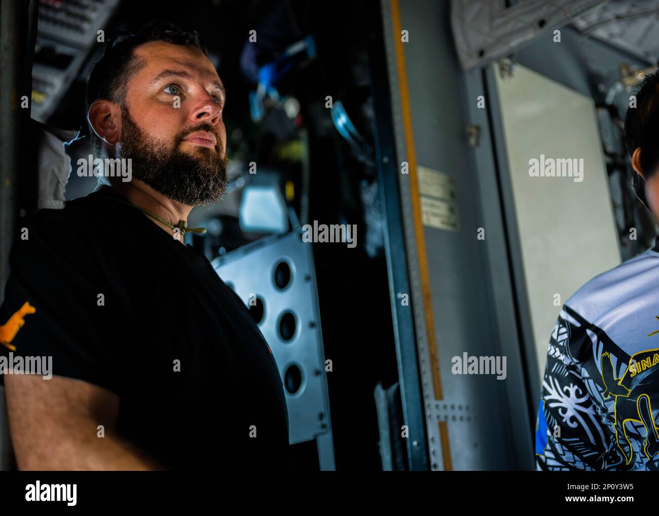 A Royal Australian Air Force member participates in a community ...