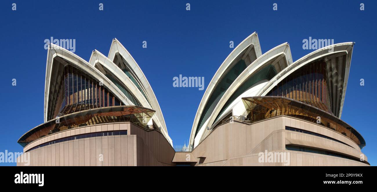 A scenic daytime view of two stunning buildings standing side by side ...