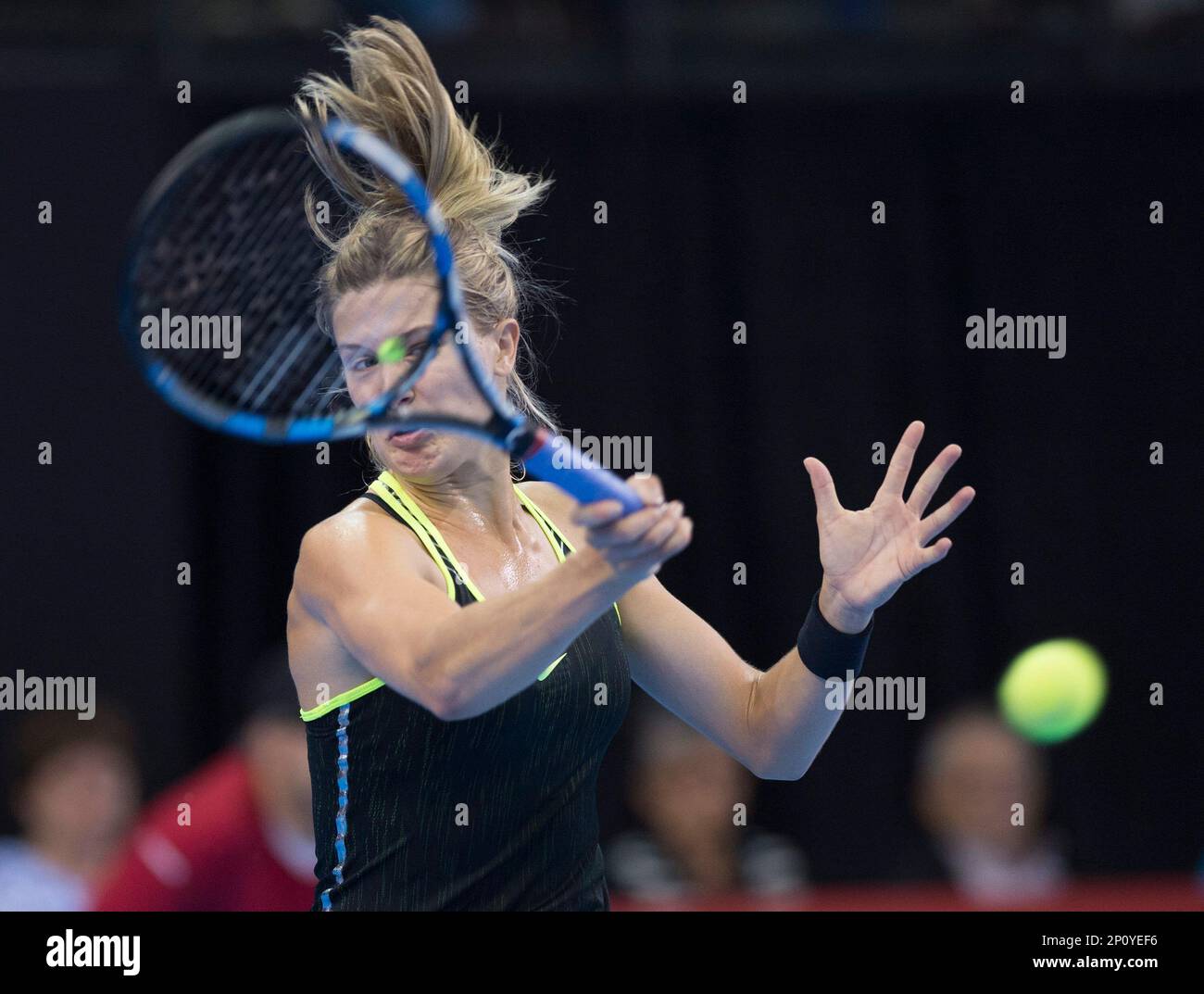 Eugenie Bouchard, of Canada, returns to Mandy Minella, of Luxembourg ...