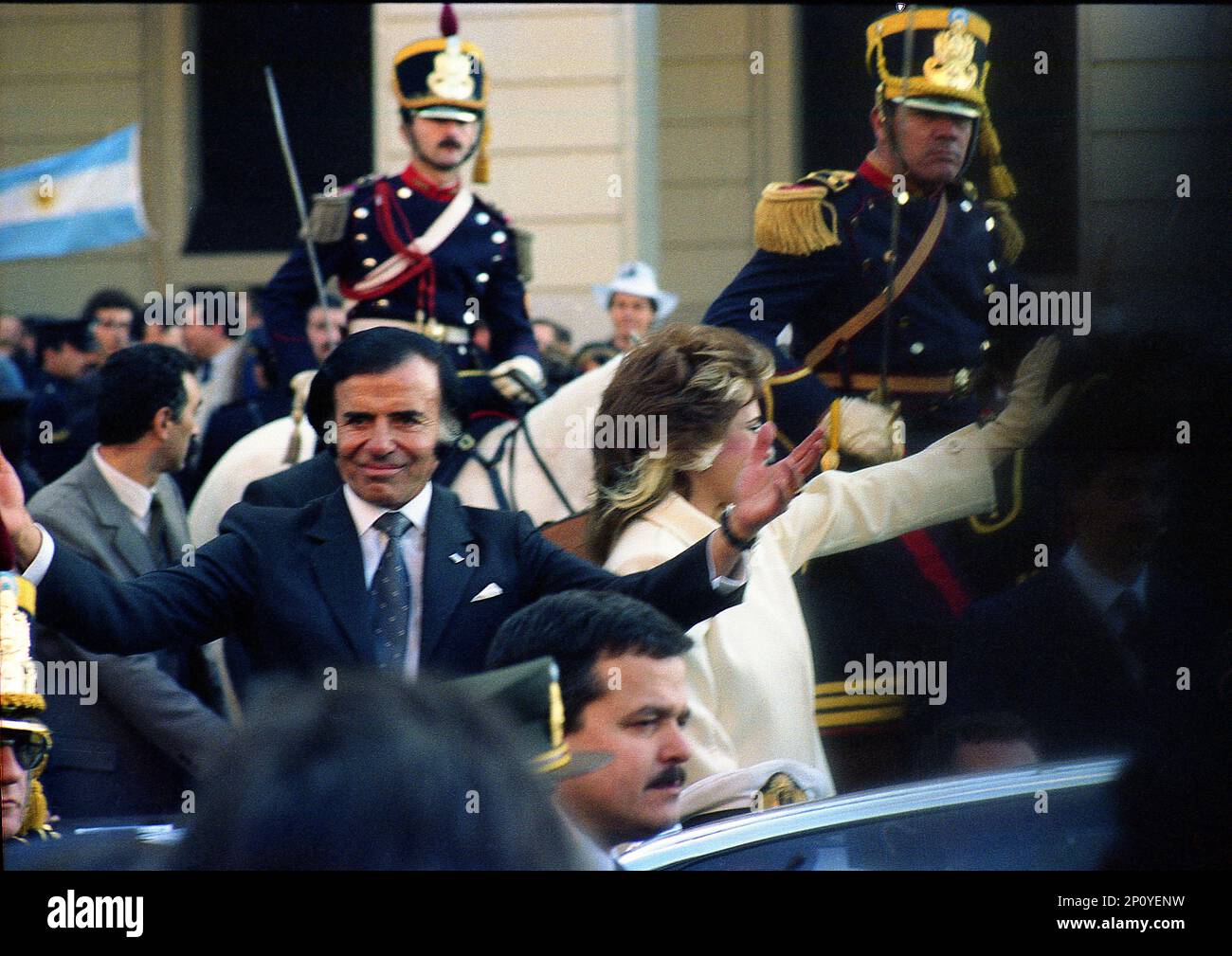 Carlos Saúl Menem and First Lady Zulema Yoma greet supporters in a ...