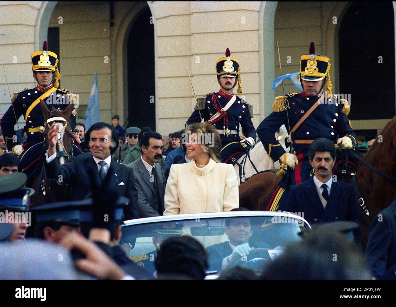 Carlos Saúl Menem and First Lady Zulema Yoma, in a motorcade ...