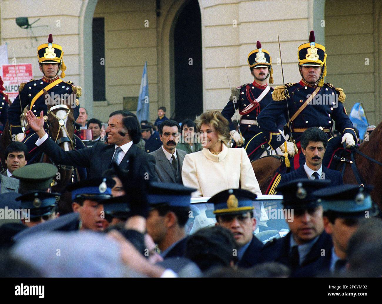 Carlos Saúl Menem and First Lady Zulema Yoma, in a motorcade ...