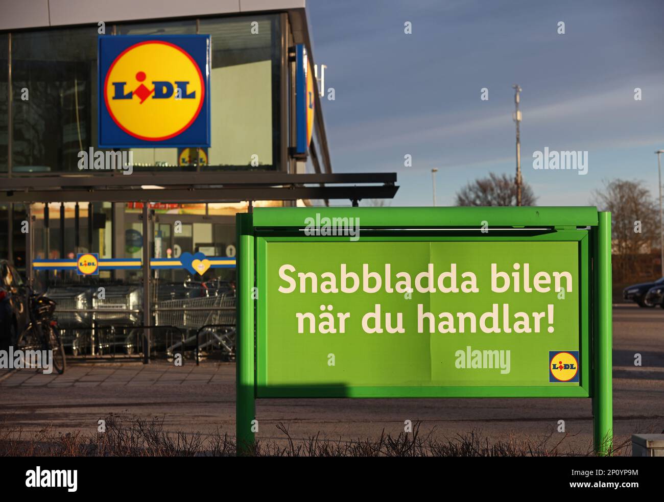 A Lidl grocery store, Motala, Sweden. Here is a sign that customers can charge the electric car ...